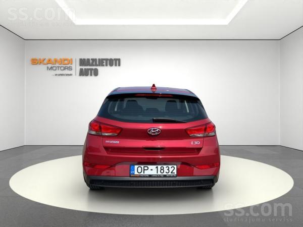 Red Hyundai i30 2022 in Riga, with an engine capacity of 1.50 L and mileage of 80 thousand km for 11990 €, photo 5 on AUTOMOTO.COM.LV