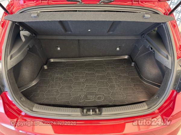 Red Hyundai i30 2023 in Tallinn, with an engine capacity of 1.00 L and mileage of 44 thousand km for 15900 €, photo 6 on AUTOMOTO.COM.LV