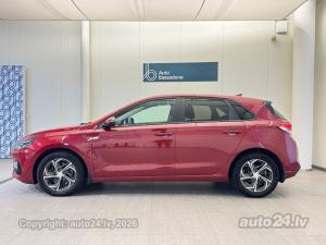 Red Hyundai i30 2023 in Tallinn, with an engine capacity of 1.00 L and mileage of 70 thousand km for 15900 €, photo 4 on AUTOMOTO.COM.LV