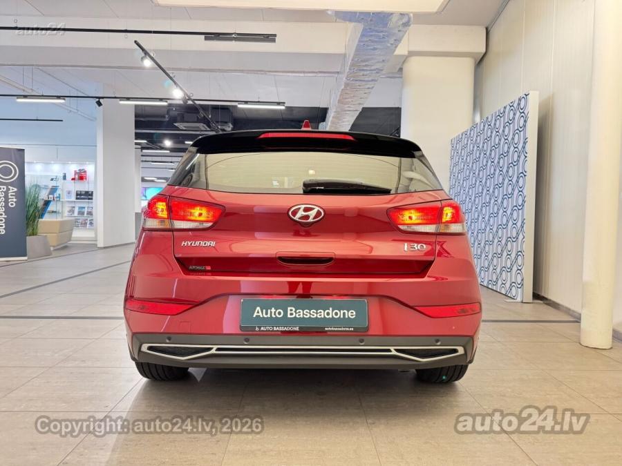 Red Hyundai i30 2023 in Tallinn, with an engine capacity of 1.00 L and mileage of 70 thousand km for 15900 €, photo 6 on AUTOMOTO.COM.LV