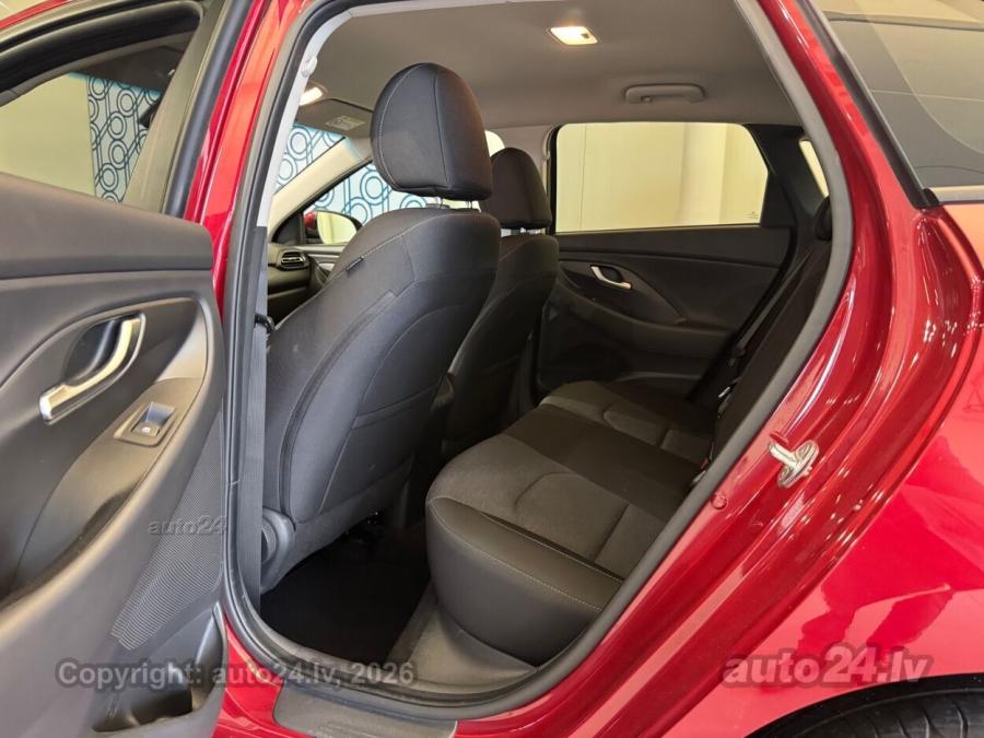 Red Hyundai i30 2023 in Tallinn, with an engine capacity of 1.00 L and mileage of 70 thousand km for 15900 €, photo 19 on AUTOMOTO.COM.LV