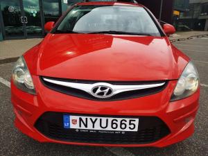 Red Hyundai i30 2010 in Vilnius, with an engine capacity of 1.58 L and mileage of 264 thousand km for 2650 €, photo 7 on AUTOMOTO.COM.LV