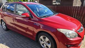 Sarkans Hyundai i30 2012 Kauņa, ar dzinēja tilpumu 1.58 L un nobraukumu 219 tūkst. km par 2600 €, foto  vietnē AUTOMOTO.COM.LV