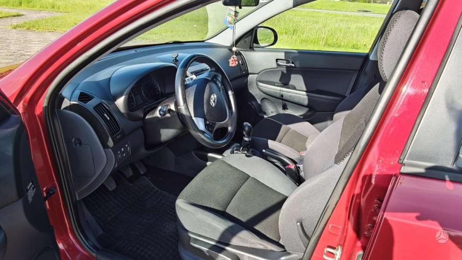 Sarkans Hyundai i30 2012 Kauņa, ar dzinēja tilpumu 1.58 L un nobraukumu 219 tūkst. km par 2600 €, foto 12 vietnē AUTOMOTO.COM.LV