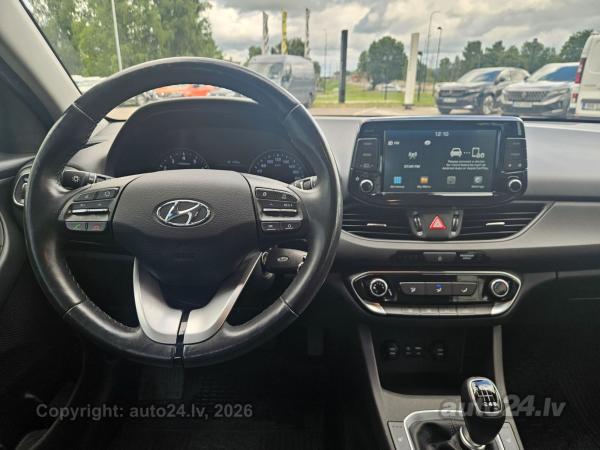 Red Hyundai i30 2020 in Tartu, with an engine capacity of 1.40 L and mileage of 75 thousand km for 11990 €, photo 8 on AUTOMOTO.COM.LV