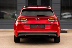 Red Hyundai i30 2021 in Jelgava, with an engine capacity of 1.50 L and mileage of 140 thousand km for 13450 €, photo 8 on AUTOMOTO.COM.LV