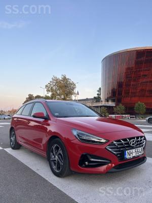 Red Hyundai i30 2022 in Liepaja, with an engine capacity of 1.00 L and mileage of 100 thousand km for 15500 €, photo  on AUTOMOTO.COM.LV