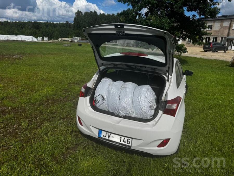 White Hyundai i30 2014 in Riga, with an engine capacity of 1.40 L and mileage of 185 thousand km for 3900 €, photo 14 on AUTOMOTO.COM.LV