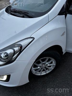 White Hyundai i30 2015 in Riga, with an engine capacity of 1.40 L and mileage of 161 thousand km for 4900 €, photo 13 on AUTOMOTO.COM.LV
