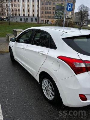 White Hyundai i30 2015 in Riga, with an engine capacity of 1.40 L and mileage of 161 thousand km for 4900 €, photo 15 on AUTOMOTO.COM.LV
