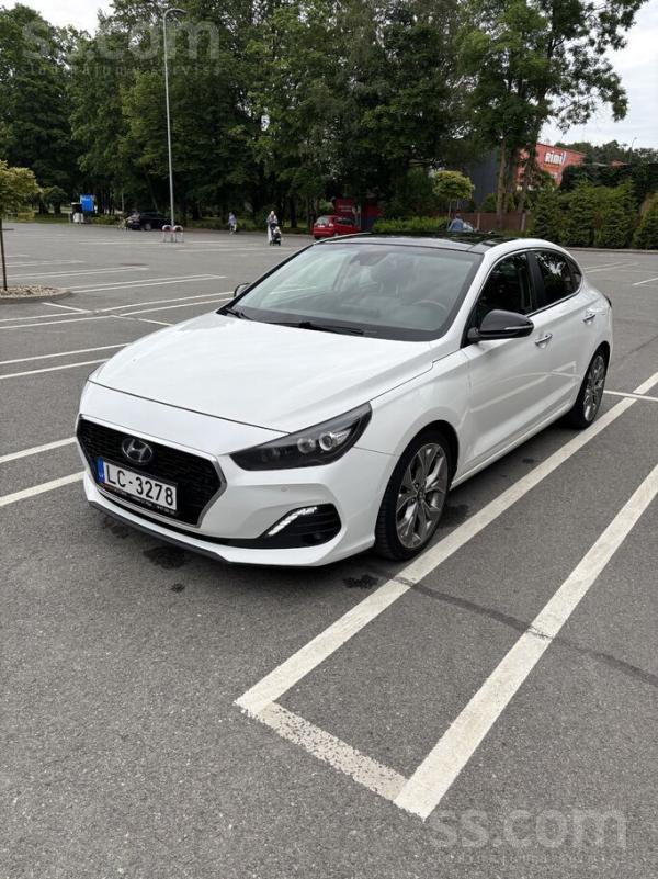 Белый Хендай i30 2018 в Рига, объемом двигателя 1.40 л и пробегом 105 тыс. км за 13790 €, фото 2 на AUTOMOTO.COM.LV