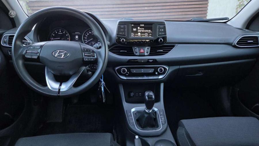 White Hyundai i30 2018 in Ukmerge, with an engine capacity of 1.37 L and mileage of 204 thousand km for 5900 €, photo 13 on AUTOMOTO.COM.LV