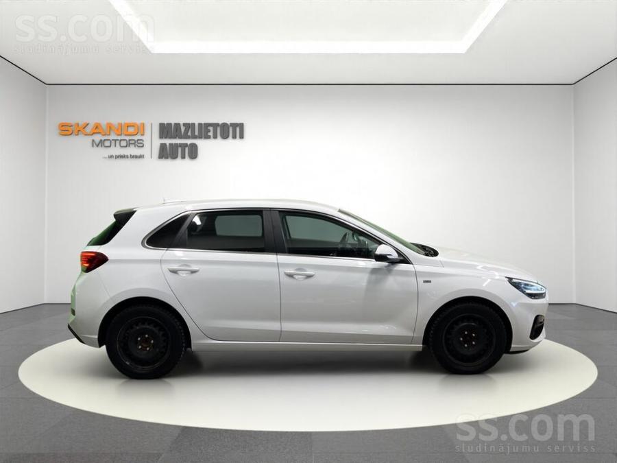 White Hyundai i30 2021 in Riga, with an engine capacity of 1.50 L and mileage of 34 thousand km for 14490 €, photo 8 on AUTOMOTO.COM.LV