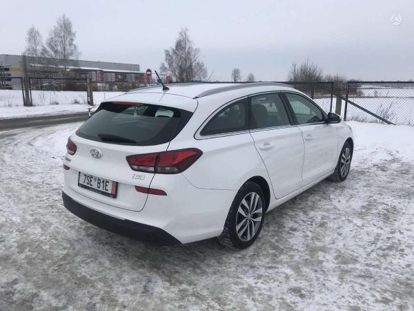White Hyundai i30 2018 in Marijampole, with an engine capacity of 1.58 L and mileage of 233 thousand km for 8400 €, photo 6 on AUTOMOTO.COM.LV
