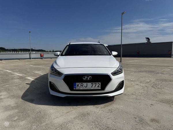White Hyundai i30 2018 in Vilnius, with an engine capacity of 1.35 L and mileage of 126 thousand km for 9600 €, photo 3 on AUTOMOTO.COM.LV