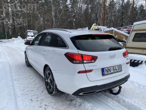 White Hyundai i30 2023 in Riga, with an engine capacity of 1.50 L and mileage of 107 thousand km for 14800 €, photo 4 on AUTOMOTO.COM.LV