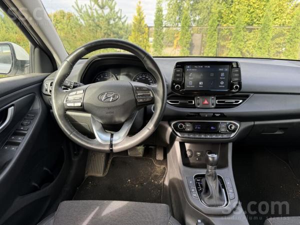 White Hyundai i30 2023 in Aizkraukle, with an engine capacity of 1.50 L and mileage of 54 thousand km for 17500 €, photo 5 on AUTOMOTO.COM.LV