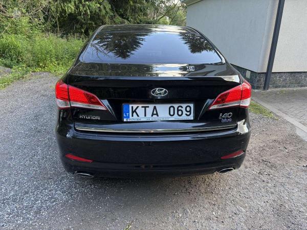Melns Hyundai i40 2013 Viļņa, ar dzinēja tilpumu 1.70 L un nobraukumu 296 tūkst. km par 4200 €, foto 5 vietnē AUTOMOTO.COM.LV
