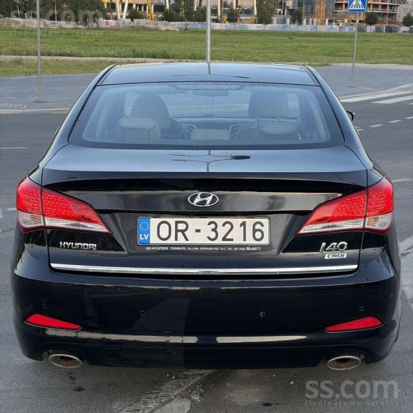 Melns Hyundai i40 2012 Rīga, ar dzinēja tilpumu 1.70 L un nobraukumu 306 tūkst. km par 4700 €, foto 8 vietnē AUTOMOTO.COM.LV