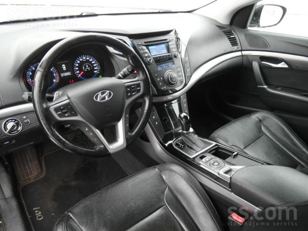 Black Hyundai i40 2013 in Riga, with an engine capacity of 2.00 L and mileage of 253 thousand km for 3990 €, photo 7 on AUTOMOTO.COM.LV