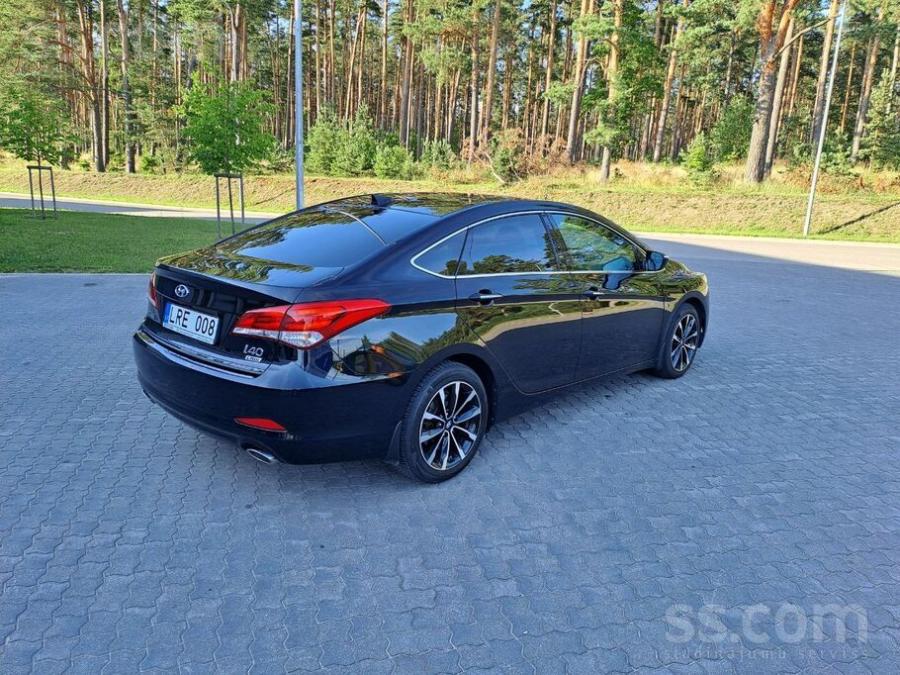 Black Hyundai i40 2017 in Riga, with an engine capacity of 1.70 L and mileage of 164 thousand km for 9500 €, photo 6 on AUTOMOTO.COM.LV