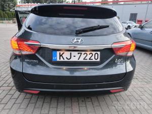Black Hyundai i40 2012 in Riga, with an engine capacity of 1.70 L and mileage of 275 thousand km for 4300 €, photo 8 on AUTOMOTO.COM.LV