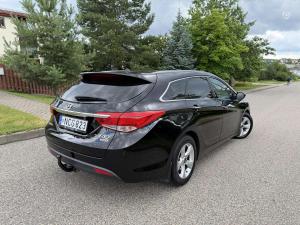 Black Hyundai i40 2012 in Vilnius, with an engine capacity of 1.69 L and mileage of 273 thousand km for 4850 €, photo 12 on AUTOMOTO.COM.LV