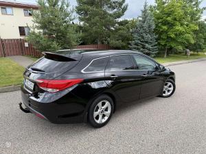 Black Hyundai i40 2012 in Vilnius, with an engine capacity of 1.69 L and mileage of 273 thousand km for 4850 €, photo 14 on AUTOMOTO.COM.LV