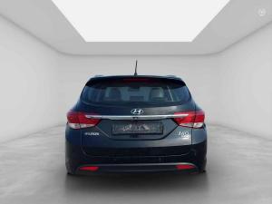 Black Hyundai i40 2013 in Kaunas, with an engine capacity of 1.70 L and mileage of 255 thousand km for 5490 €, photo 6 on AUTOMOTO.COM.LV