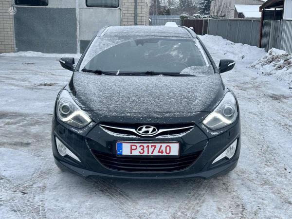 Black Hyundai i40 2014 in Kaunas, with an engine capacity of 1.69 L and mileage of 154 thousand km for 5400 €, photo 2 on AUTOMOTO.COM.LV
