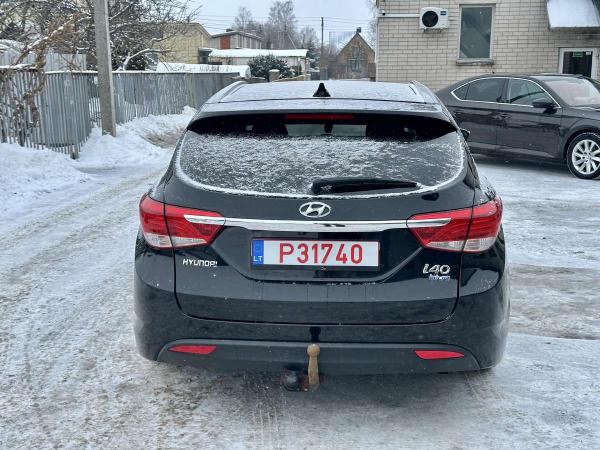 Black Hyundai i40 2014 in Kaunas, with an engine capacity of 1.69 L and mileage of 154 thousand km for 5400 €, photo 6 on AUTOMOTO.COM.LV