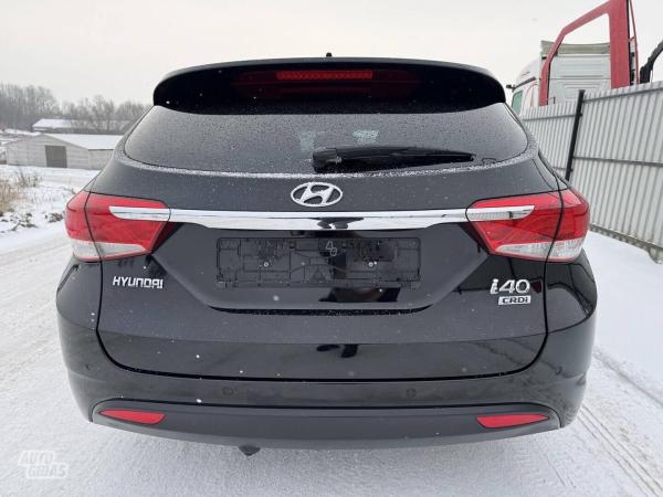 Black Hyundai i40 2015 in Marijampole, with an engine capacity of 1.70 L and mileage of 257 thousand km for 4950 €, photo 6 on AUTOMOTO.COM.LV