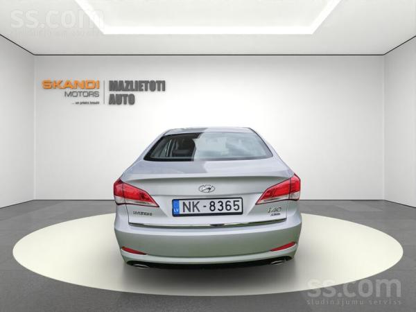 Pelēks Hyundai i40 2013 Liepāja, ar dzinēja tilpumu 1.70 L un nobraukumu 249 tūkst. km par 4650 €, foto 5 vietnē AUTOMOTO.COM.LV