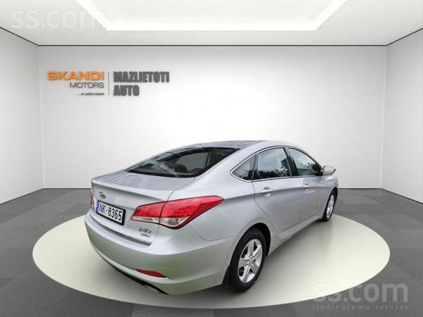 Pelēks Hyundai i40 2013 Liepāja, ar dzinēja tilpumu 1.70 L un nobraukumu 249 tūkst. km par 4650 €, foto 6 vietnē AUTOMOTO.COM.LV