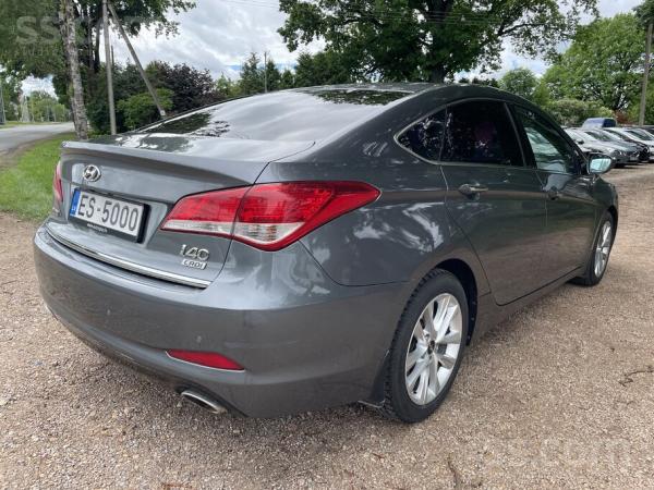 Pelēks Hyundai i40 2015 Rīga, ar dzinēja tilpumu 1.70 L un nobraukumu 282 tūkst. km par 7800 €, foto 5 vietnē AUTOMOTO.COM.LV