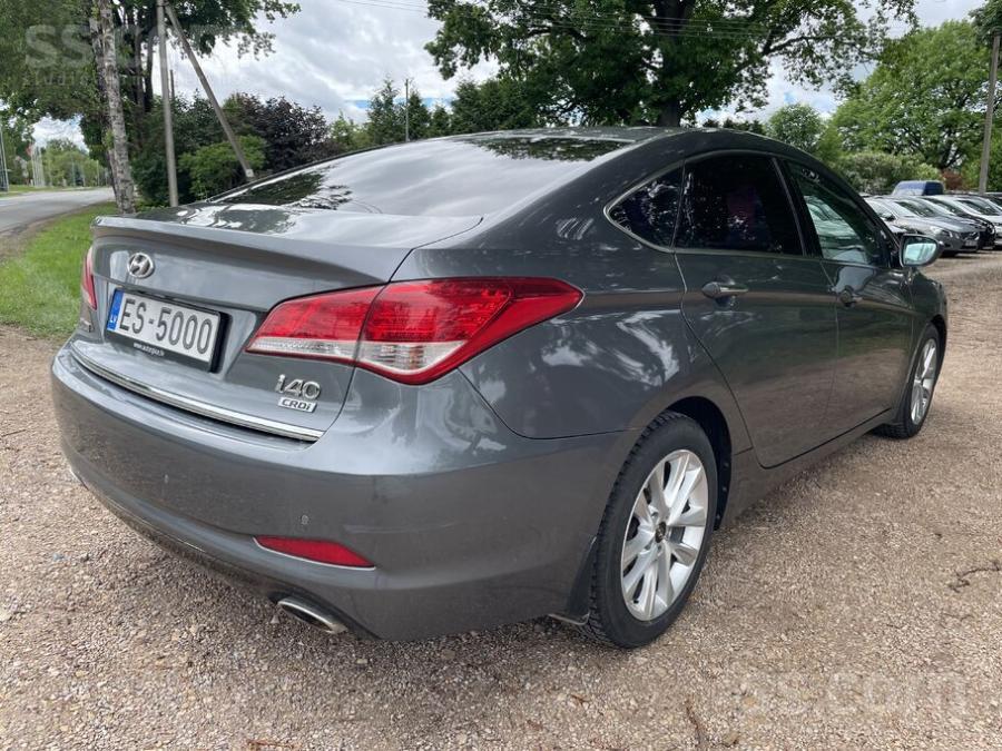 Pelēks Hyundai i40 2015 Rīga, ar dzinēja tilpumu 1.70 L un nobraukumu 282 tūkst. km par 7800 €, foto 6 vietnē AUTOMOTO.COM.LV
