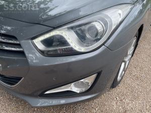 Pelēks Hyundai i40 2015 Rīga, ar dzinēja tilpumu 1.70 L un nobraukumu 282 tūkst. km par 7800 €, foto 11 vietnē AUTOMOTO.COM.LV