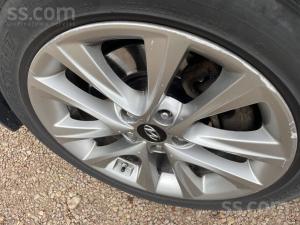 Pelēks Hyundai i40 2015 Rīga, ar dzinēja tilpumu 1.70 L un nobraukumu 282 tūkst. km par 7800 €, foto 32 vietnē AUTOMOTO.COM.LV