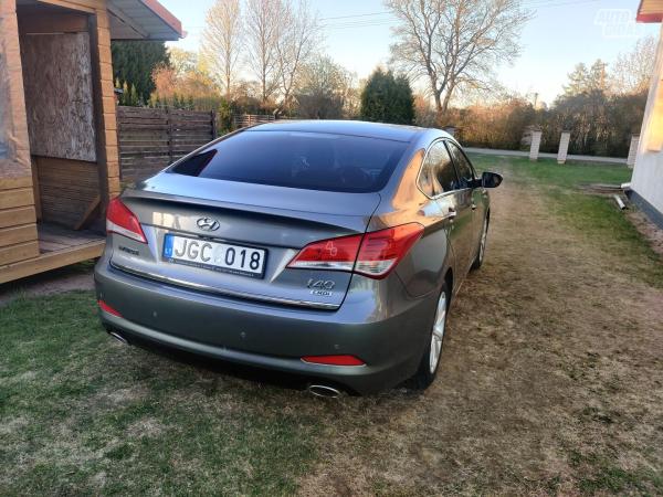 Grey Hyundai i40 2012 in Jonava, with an engine capacity of 1.70 L and mileage of 208 thousand km for 7200 €, photo 3 on AUTOMOTO.COM.LV