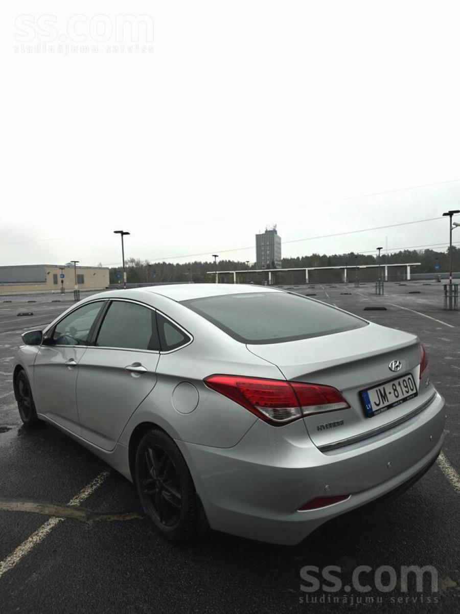 Pelēks Hyundai i40 2014 Rīga, ar dzinēja tilpumu 1.60 L un nobraukumu 215 tūkst. km par 5980 €, foto 5 vietnē AUTOMOTO.COM.LV