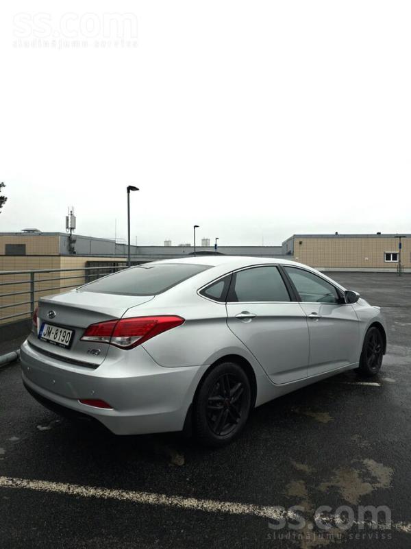 Grey Hyundai i40 2014 in Riga, with an engine capacity of 1.60 L and mileage of 215 thousand km for 5980 €, photo 7 on AUTOMOTO.COM.LV