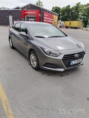 Pelēks Hyundai i40 2015 Rīga, ar dzinēja tilpumu 1.70 L un nobraukumu 158 tūkst. km par 7900 €, foto  vietnē AUTOMOTO.COM.LV