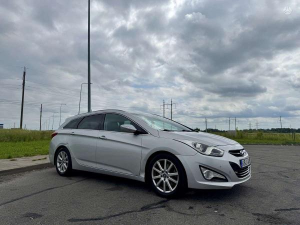 Pelēks Hyundai i40 2012 Panevēža, ar dzinēja tilpumu 1.69 L un nobraukumu 366 tūkst. km par 2750 €, foto 4 vietnē AUTOMOTO.COM.LV