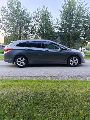Grey Hyundai i40 2012 in Panevezys, with an engine capacity of 1.69 L and mileage of 251 thousand km for 5390 €, photo 12 on AUTOMOTO.COM.LV