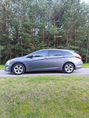 Grey Hyundai i40 2012 in Panevezys, with an engine capacity of 1.69 L and mileage of 251 thousand km for 5390 €, photo 16 on AUTOMOTO.COM.LV