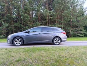 Grey Hyundai i40 2012 in Panevezys, with an engine capacity of 1.69 L and mileage of 251 thousand km for 5390 €, photo 18 on AUTOMOTO.COM.LV