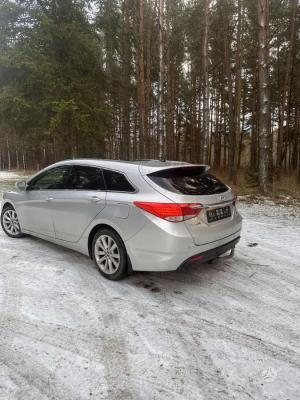 Grey Hyundai i40 2013 in Rokiskis, with an engine capacity of 1.69 L and mileage of 157 thousand km for 2800 €, photo 6 on AUTOMOTO.COM.LV