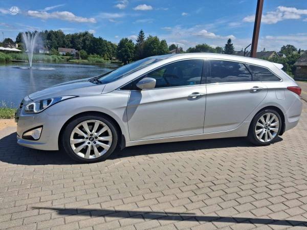 Pelēks Hyundai i40 2013 Raseiniai, ar dzinēja tilpumu 1.69 L un nobraukumu 196 tūkst. km par 4500 €, foto 4 vietnē AUTOMOTO.COM.LV
