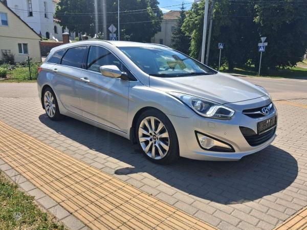 Pelēks Hyundai i40 2013 Raseiniai, ar dzinēja tilpumu 1.69 L un nobraukumu 196 tūkst. km par 4500 €, foto 5 vietnē AUTOMOTO.COM.LV