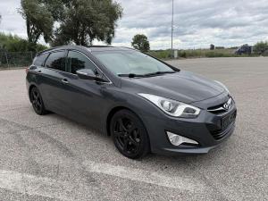 Pelēks Hyundai i40 2013 Marijampole, ar dzinēja tilpumu 1.70 L un nobraukumu 257 tūkst. km par 4950 €, foto 4 vietnē AUTOMOTO.COM.LV